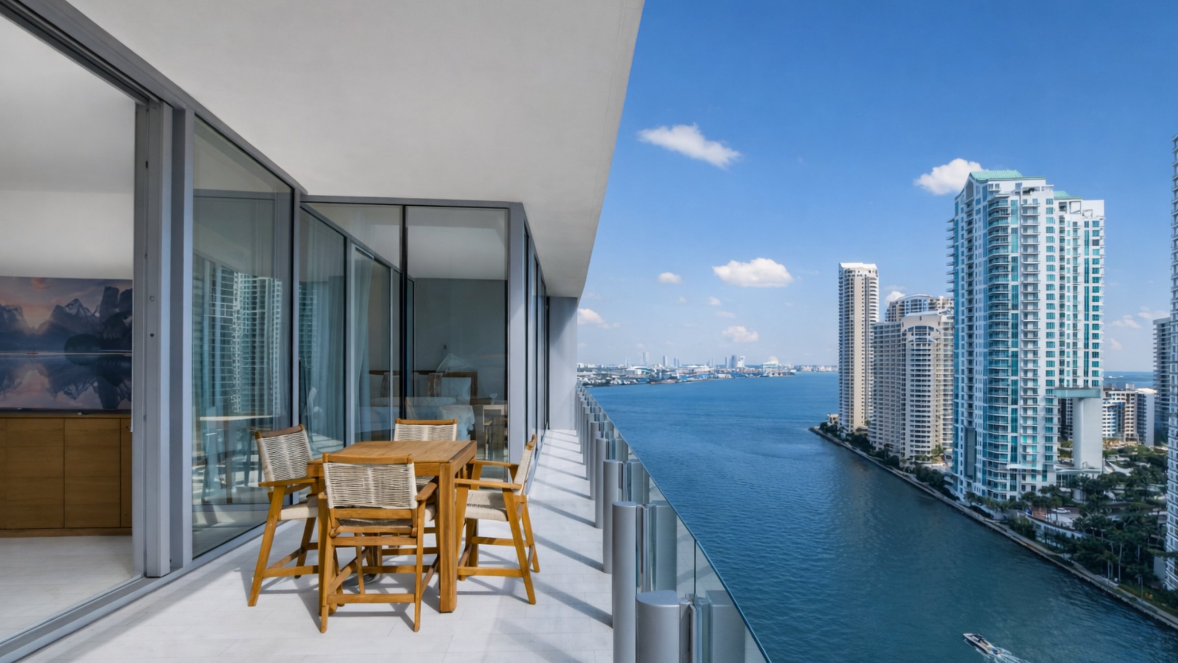 under_700kb_balcony_waterway - Haute Residence by Haute Living