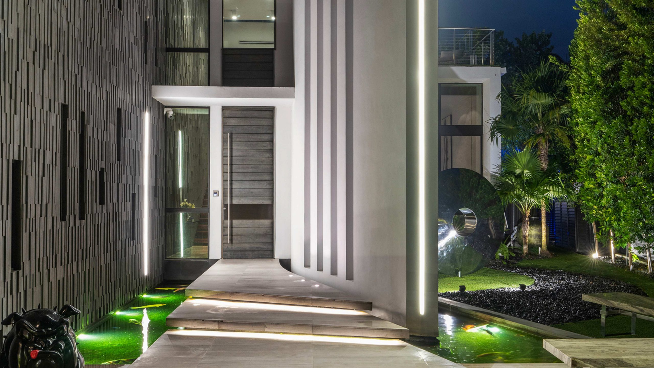 under_700kb_entry_night - Haute Residence by Haute Living