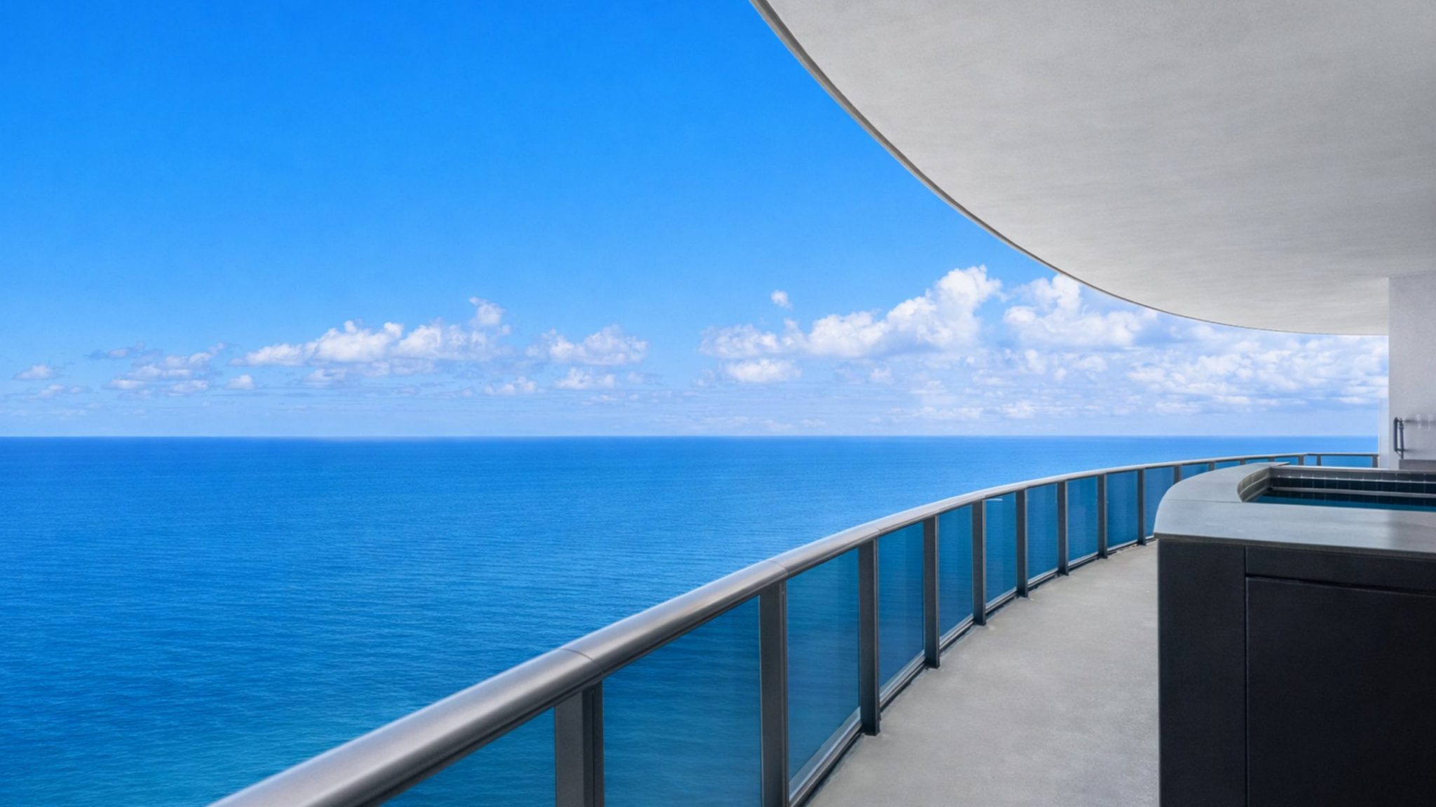 under_700kb_ocean_balcony_curve - Haute Residence by Haute Living